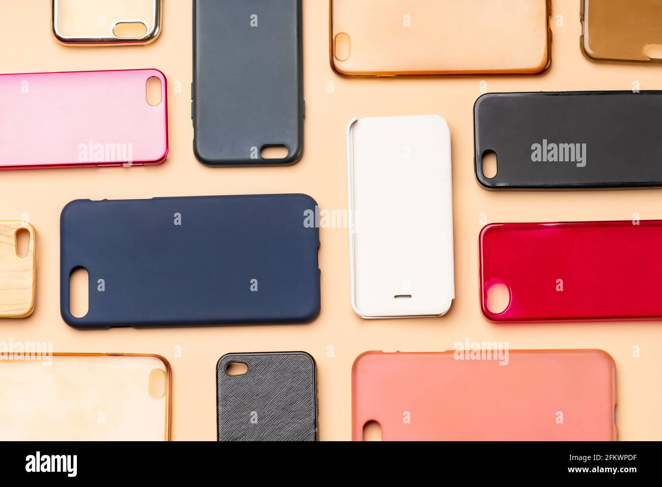 Pile of multicolored plastic back covers for mobile phone. Choice of ...