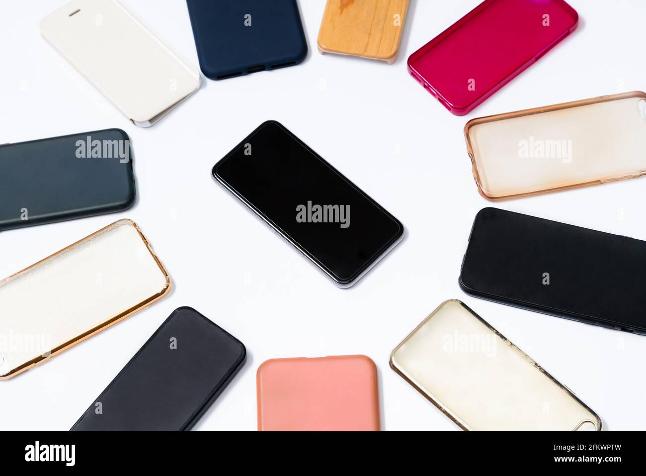 Pile of multicolored plastic back covers for mobile phone on white ...
