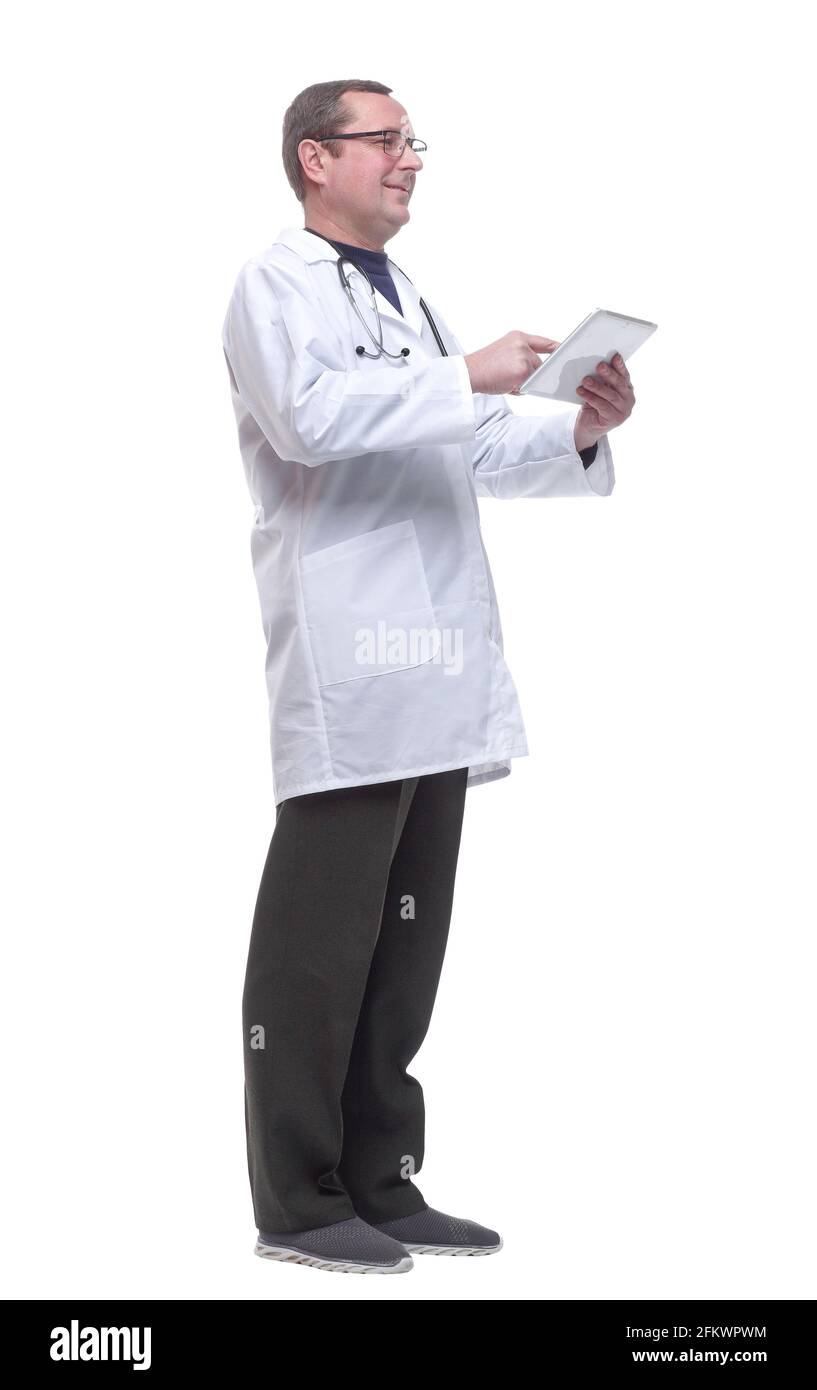 side view. doctor with a stethoscope using a digital tablet Stock Photo ...
