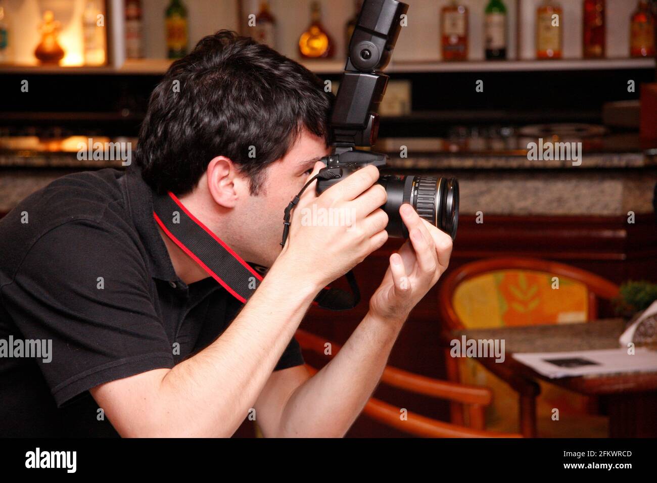 Photographer preparing to make a beautiful photograph Stock Photo - Alamy
