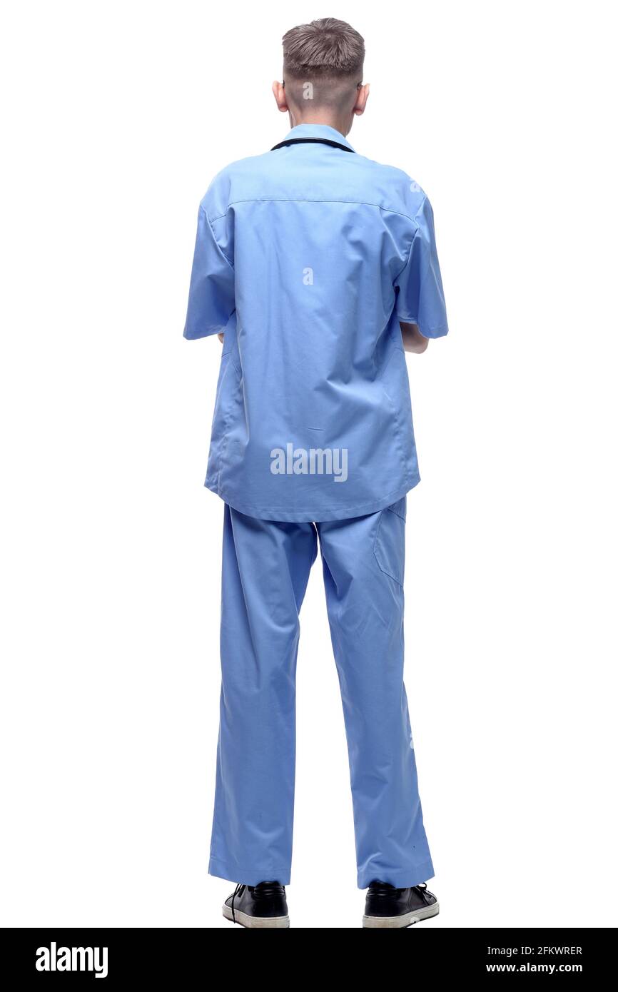 rear view. paramedic in a blue uniform reading an ad on a white screen ...