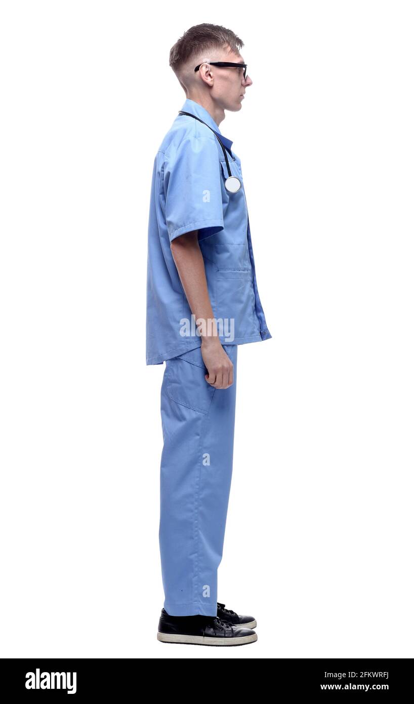 side view. serious paramedic with a stethoscope looking at a white ...