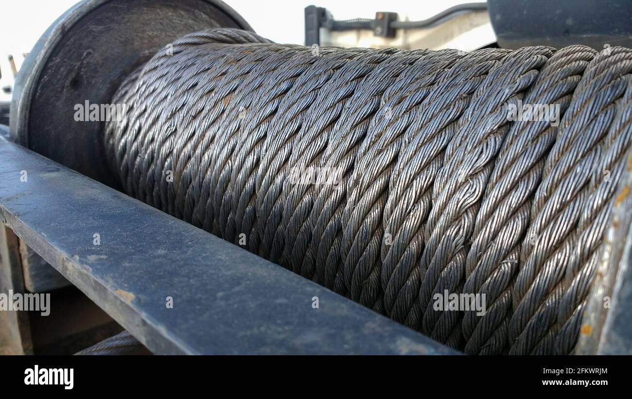 Steel cable wrapped in winch for cars. Plenty of contrast Stock Photo ...