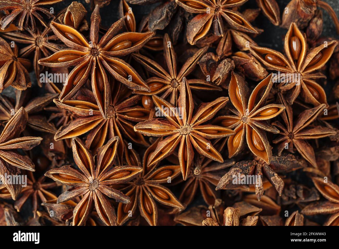 Star anise spice texture background Stock Photo - Alamy