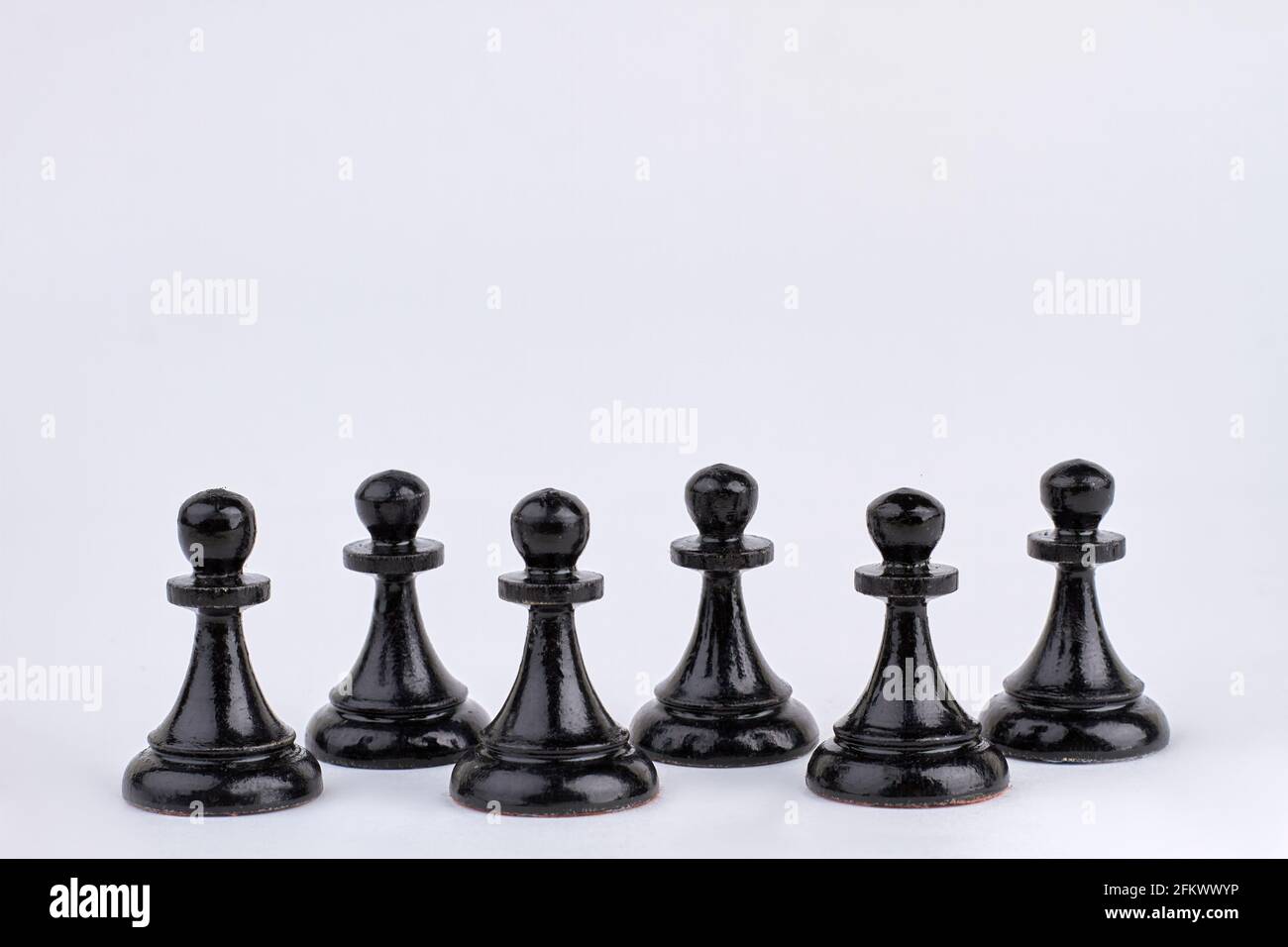Black chess pawn figures isolated on white background Stock Photo - Alamy