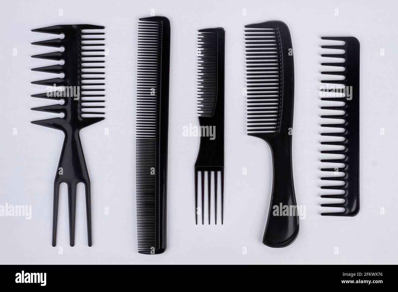 Collection of plastic combs for hair isolated on white background Stock ...
