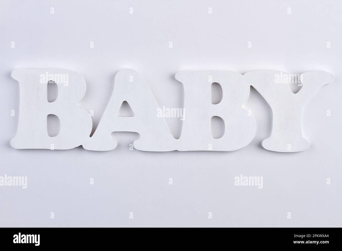 Word BABY from plastic letters close up Stock Photo - Alamy