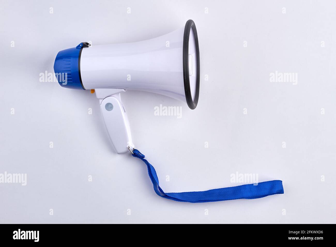 Blue and white megaphone isolated on white background Stock Photo - Alamy