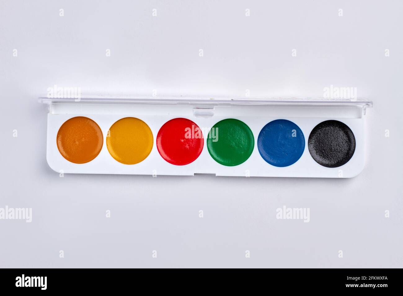 Top view of watercolor paints palette isolated on white background ...