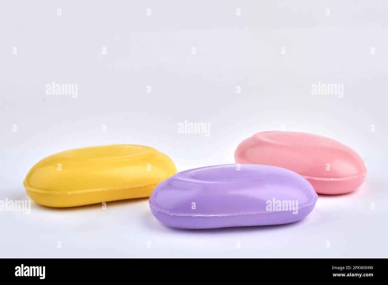 Three colorful bars of soap isolated on white background Stock Photo ...