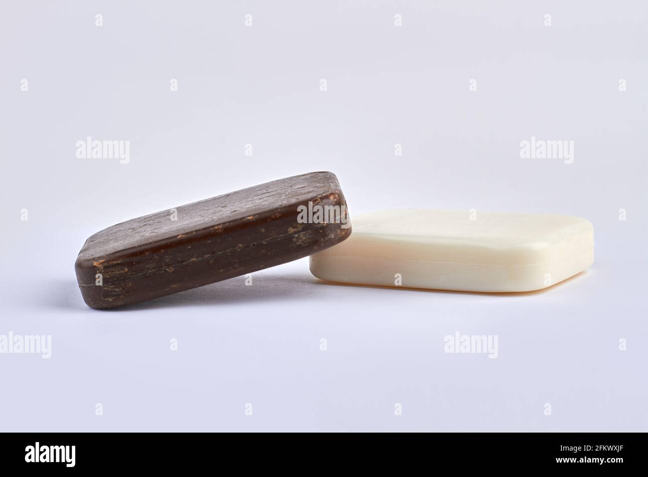 Two bars of soap on white background Stock Photo - Alamy