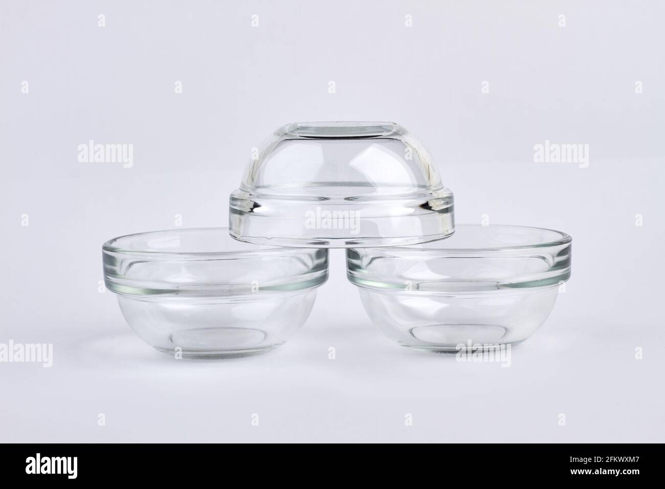 Collection of empty glass bowls isolated on white background Stock ...