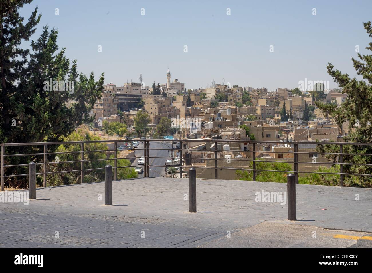 The old town of Amman seen from a viewpoint with a part of the platform ...