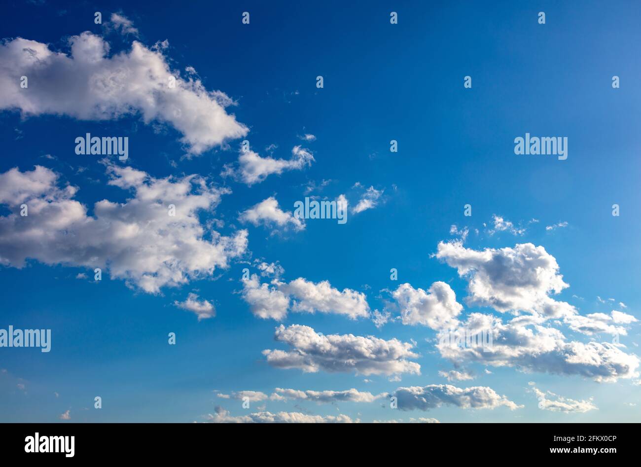 Fluffy cumulus clouds white and grey color, Cloudscape on blue sky ...