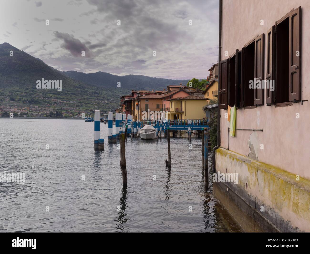 Monte Isola, Italy - May 1, 2021: On the lake shore of Monte Isola, the ...