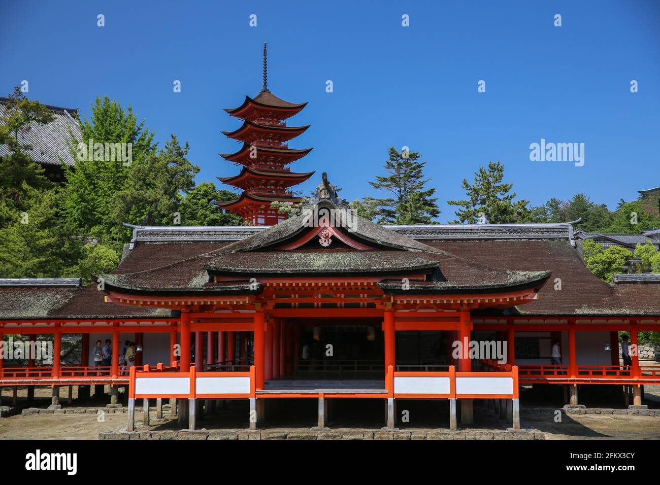 Itsukushima Ancient Japanese Shinto Shrine with red pagoda on Miyajima ...