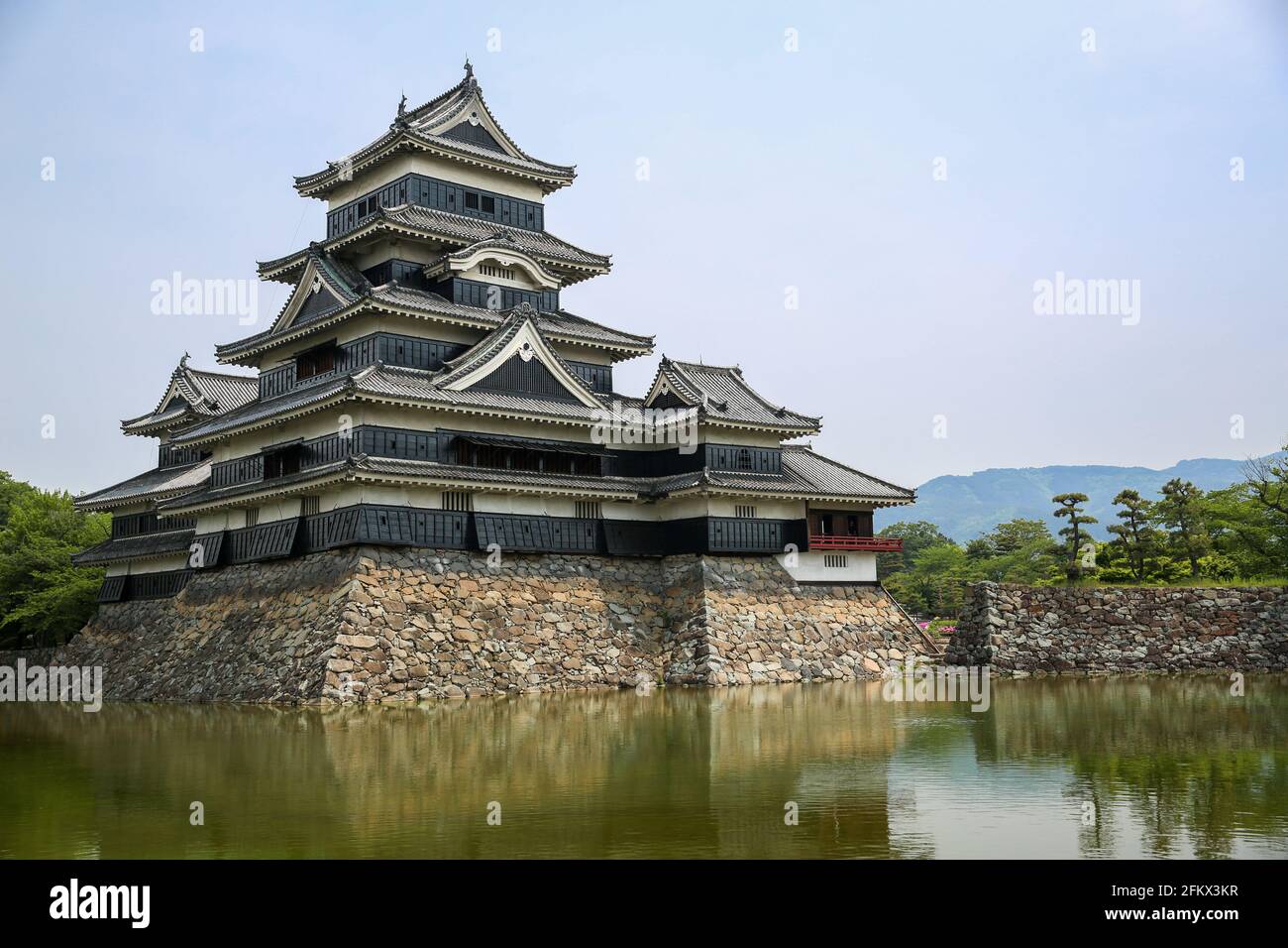 Matsumoto Castle, known as The Crow Castle surrounded by a water moat ...