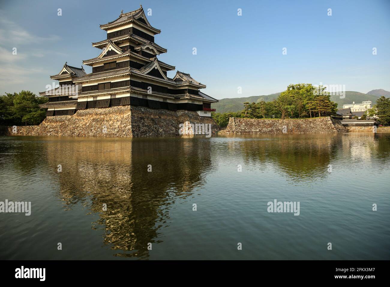 Matsumoto Castle, known as The Crow Castle with a reflection in the ...