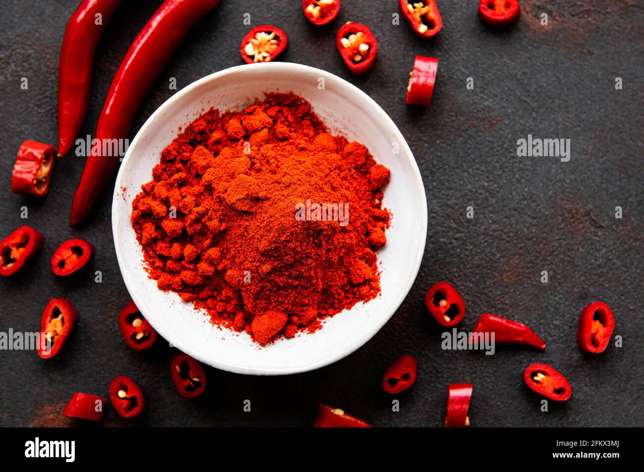 Red chili pepper, dried chillies on dark background. Top view Stock ...