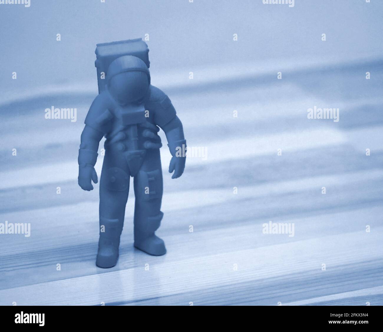 Model printed on 3d printer close-up. Cosmonaut of blue color Stock ...
