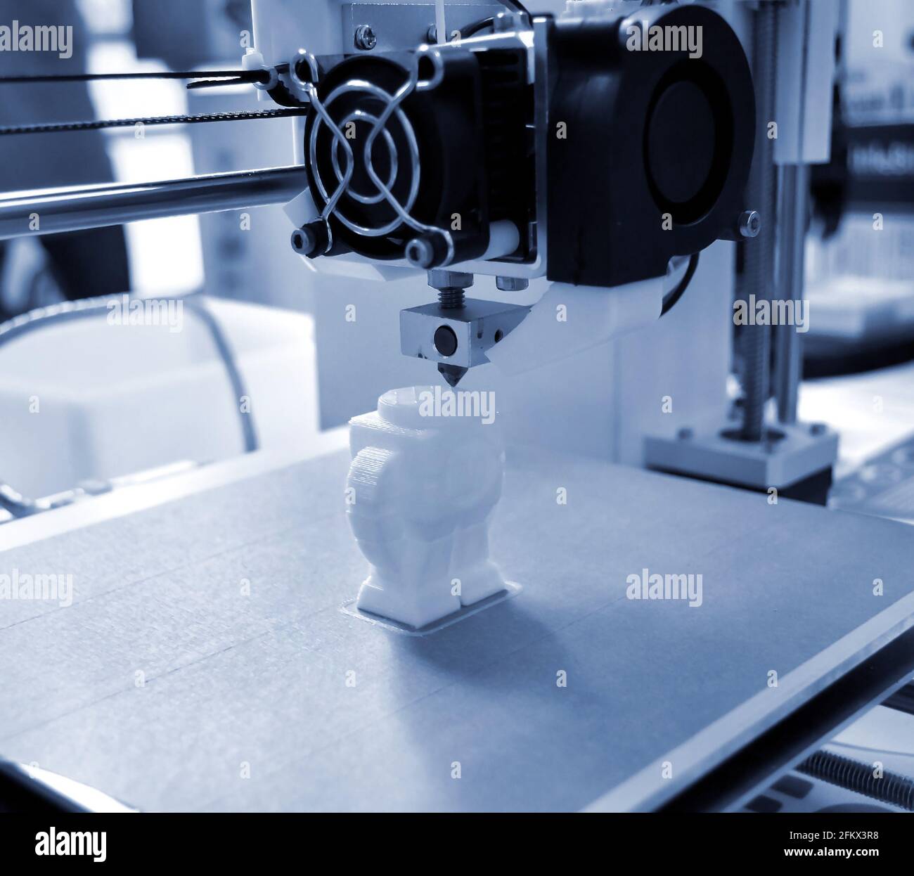 The process of working 3D printer and creating a three-dimensional ...