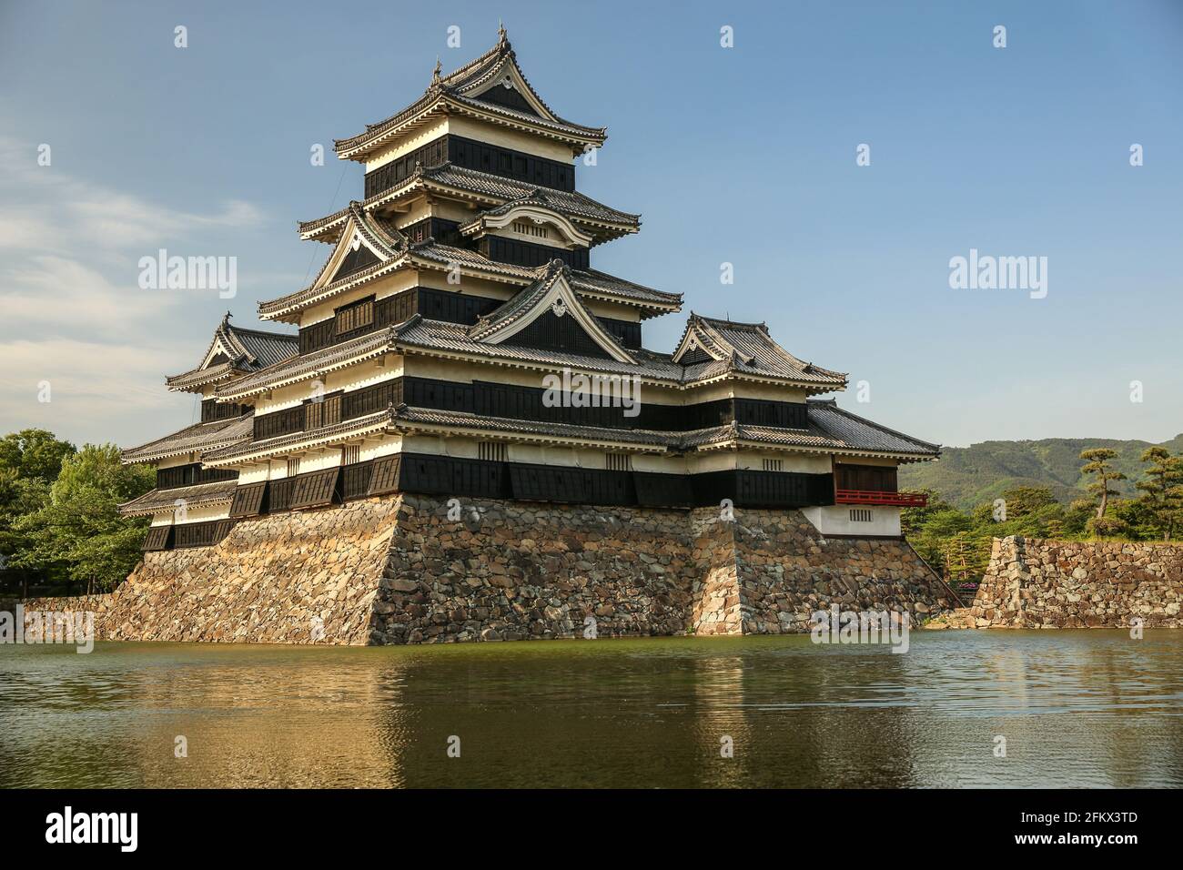 Matsumoto Castle, known as The Crow Castle on a summer day surrounded ...
