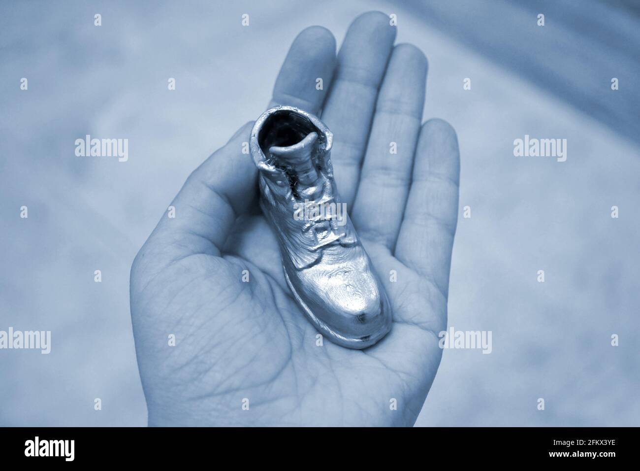 Object in the form of a boot printed on a 3d printer and covered with ...