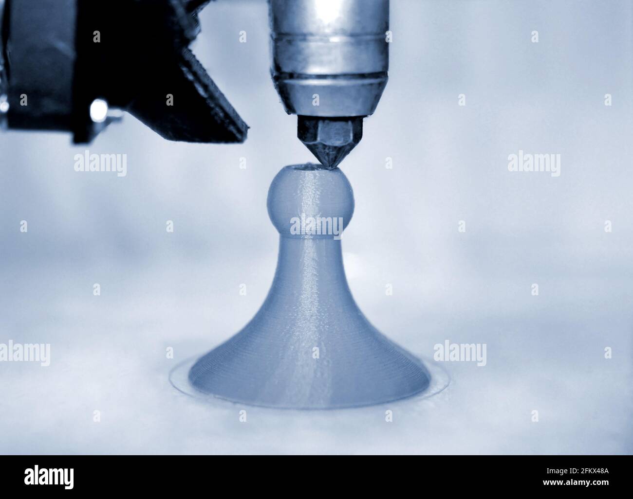 Modern 3D printer printing figure blue colors close-up Stock Photo - Alamy