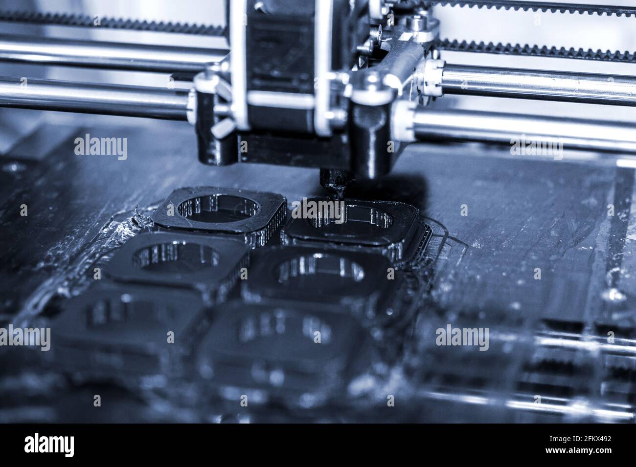 Modern 3D printer printing figure close-up. Automatic three dimensional ...