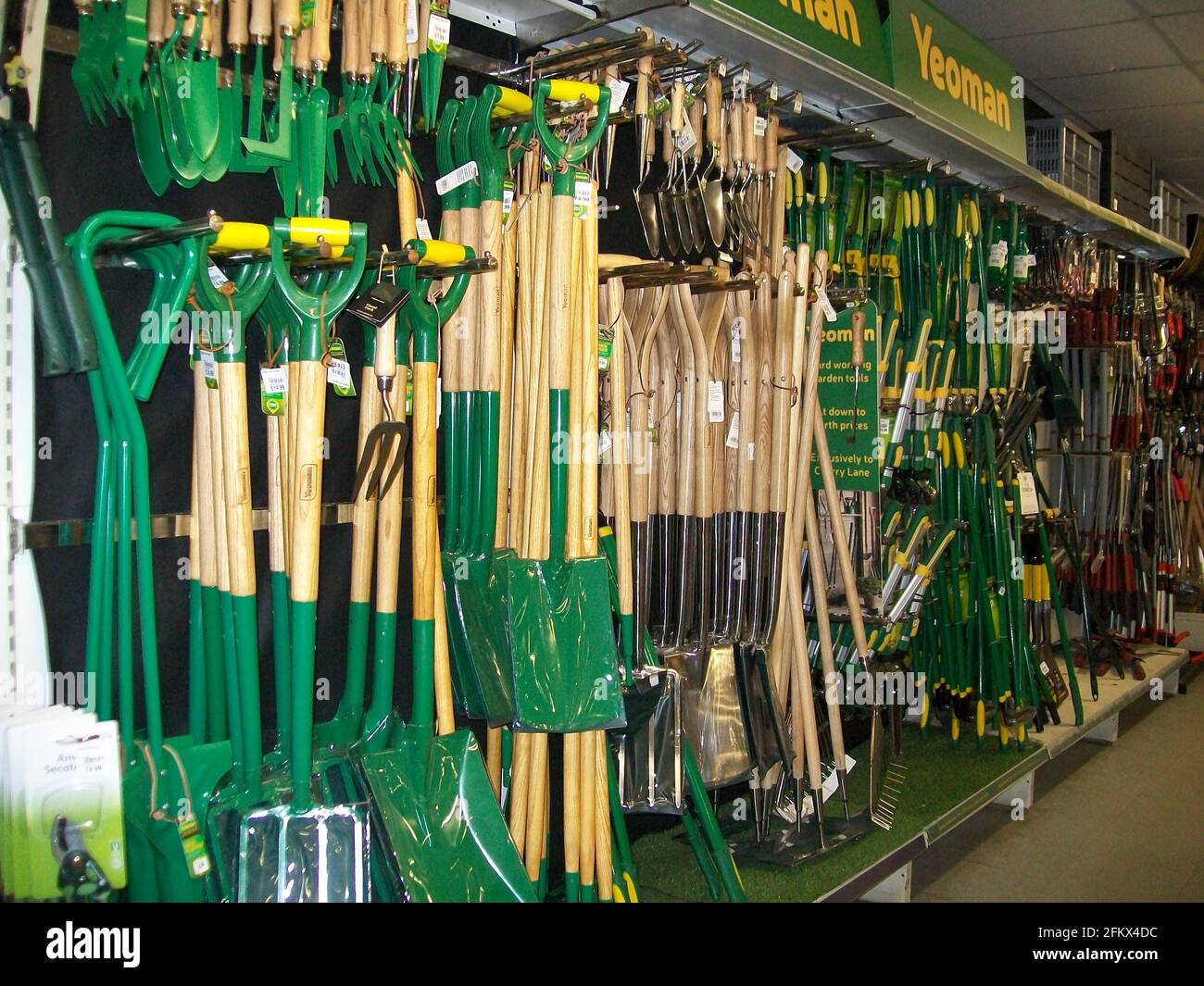 gardening centre shelves with many hand tools for the gardener Stock ...