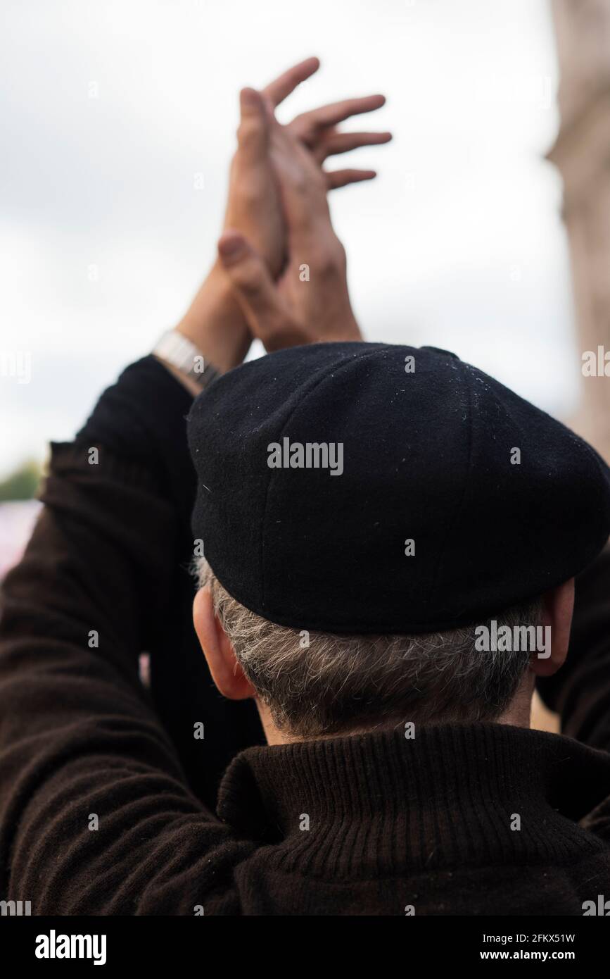 Man claps in crowd Stock Photo - Alamy