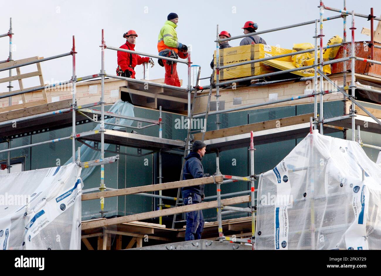 Construction workers at a construction site, Mjölby, Sweden Stock Photo ...