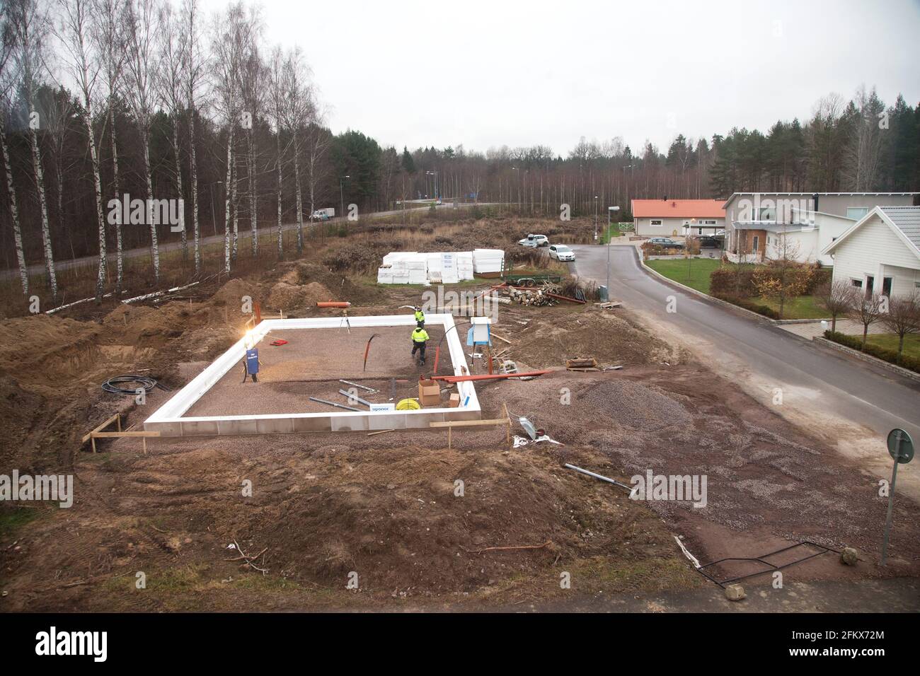 Construction workers at a construction site in a village Stock Photo ...