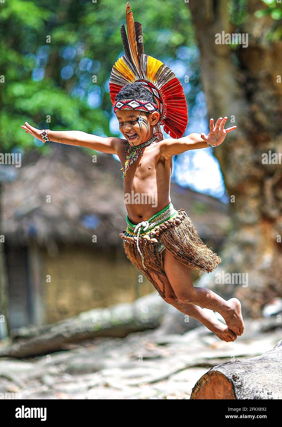 This happy child leaps from a log. BRASILIA, BRAZIL: INCREDIBLE images ...