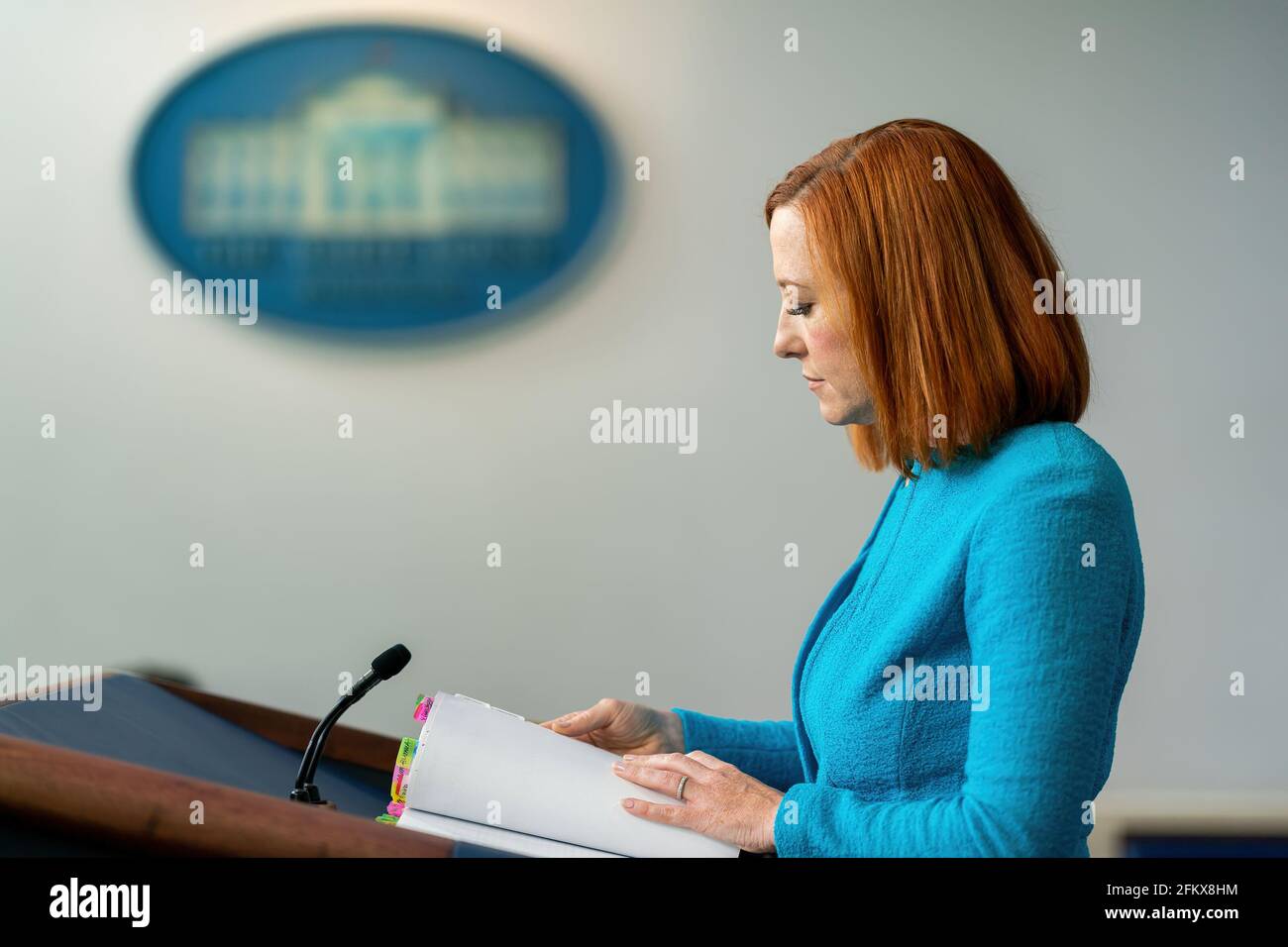 White House Press Secretary Jen Psaki pauses for a moment as she ...