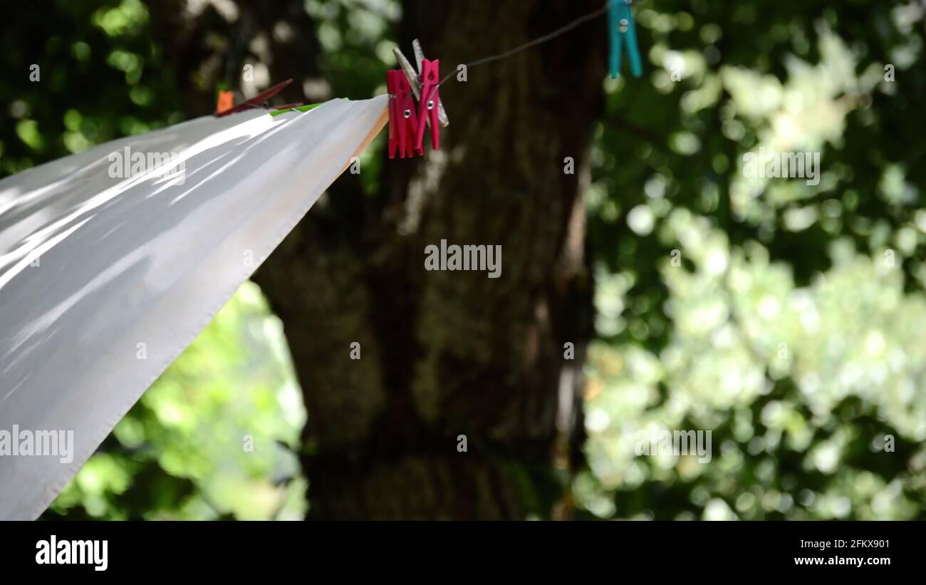 3D illustration - Fresh clean white sheets drying on washing line ...