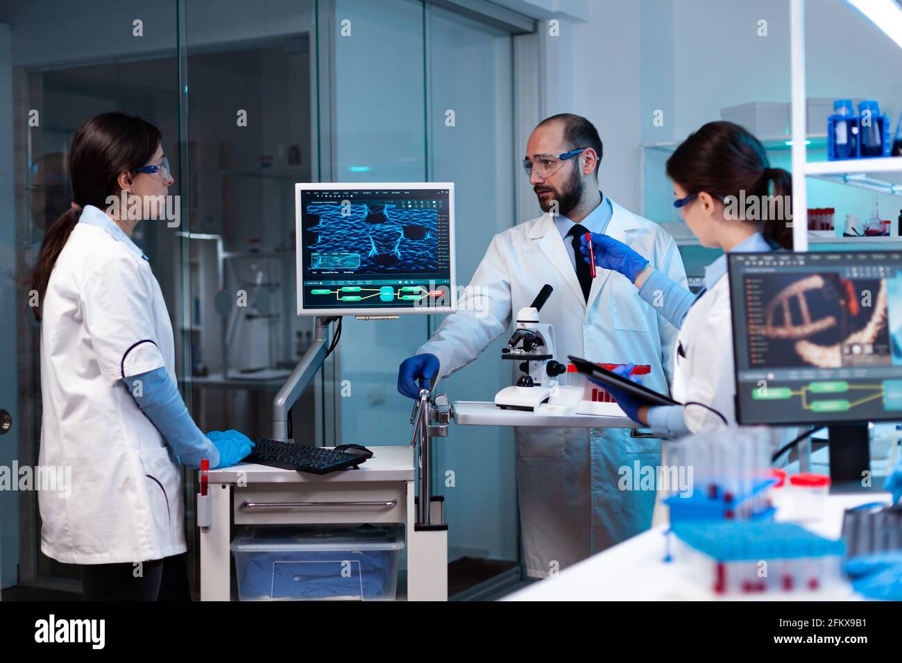 Scientists working In laboratory genetic infection for rare disease ...