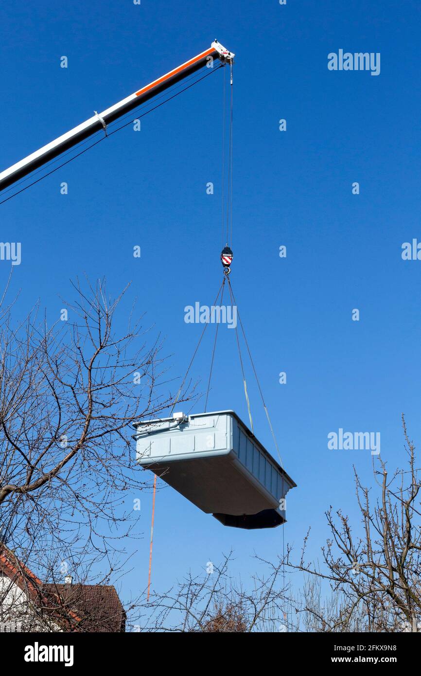 Swimming Pool Delivery, Construction Site Stock Photo - Alamy
