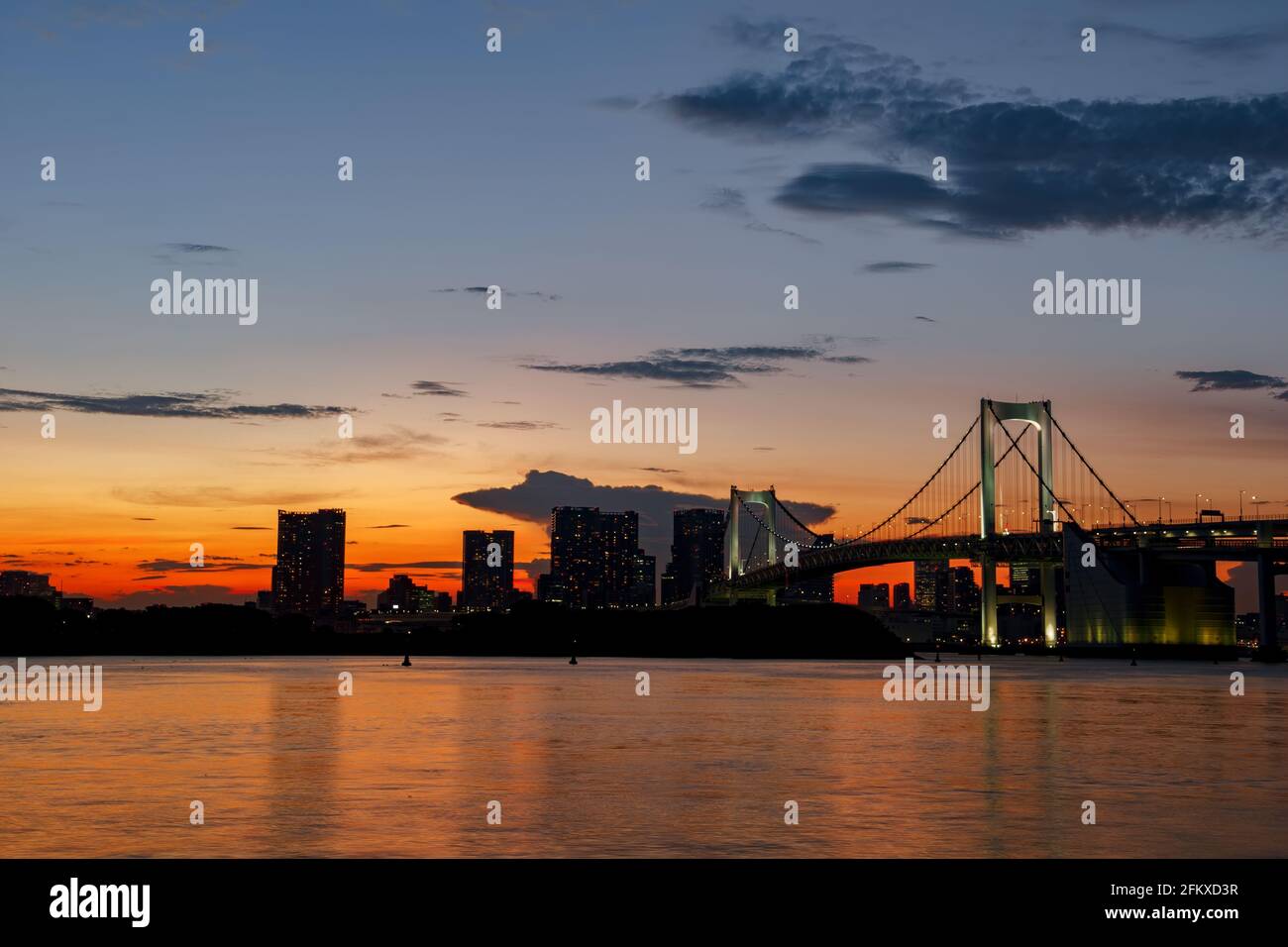 Tokyo skylines with Rainbow bridge at sunset. Japan Stock Photo - Alamy