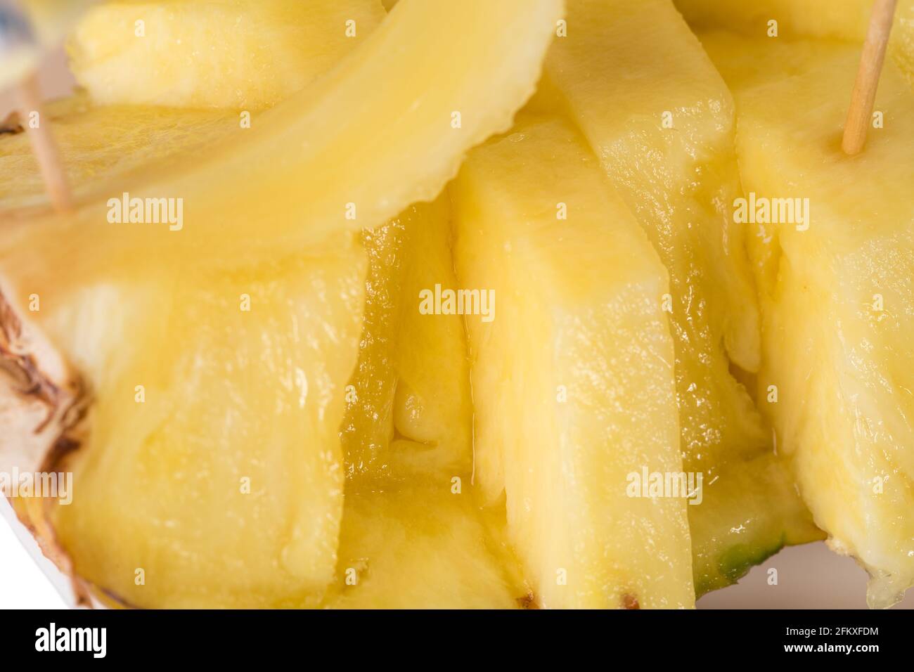 Delicious sliced pineapple. Macro shot. Photo can be used as a whole ...