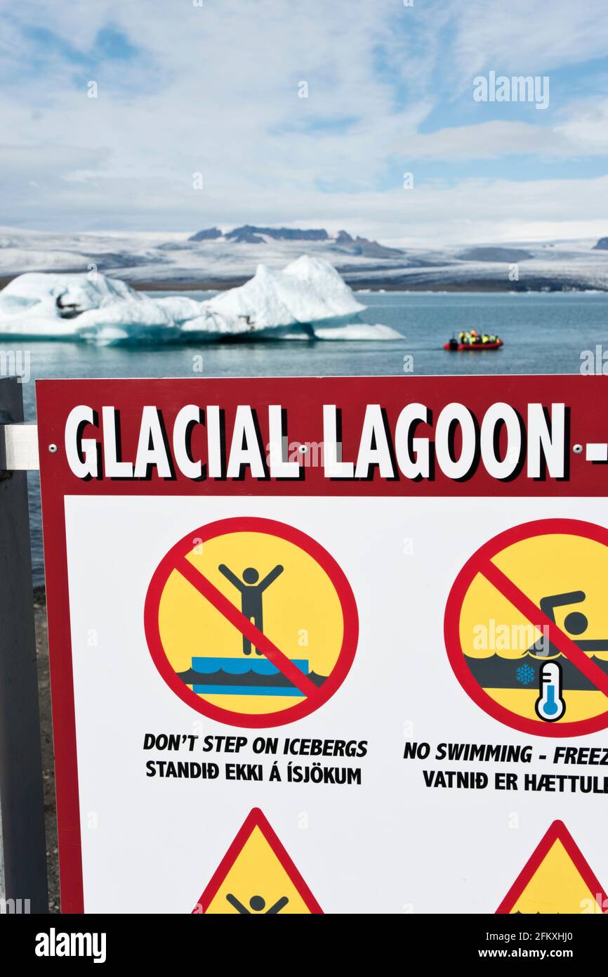 Warning signs at the Jokulsarlon glacial lagoon in Vatnajokull National ...