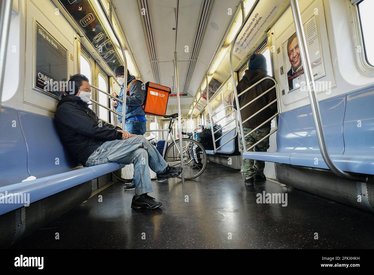 New York - NY - 20200410 Essential workers commute on the subway to and ...