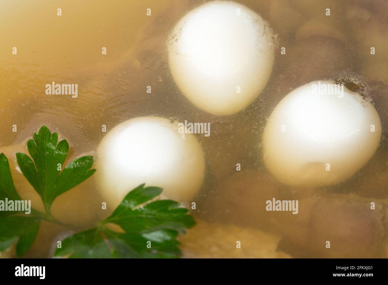 Delicious chicken meat galantine with fresh herbs and quail eggs ...