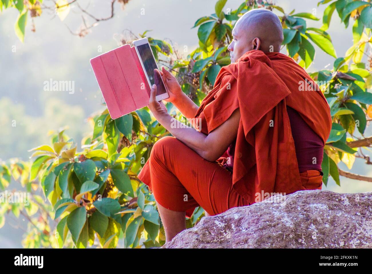 Monk with computer hi-res stock photography and images - Alamy