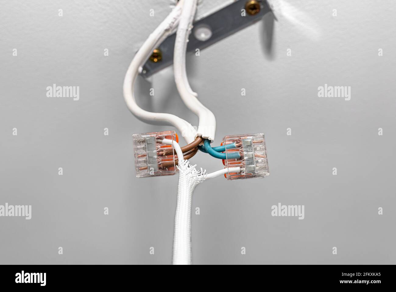 Cables from the LED lighting connected to the power supply in the ...
