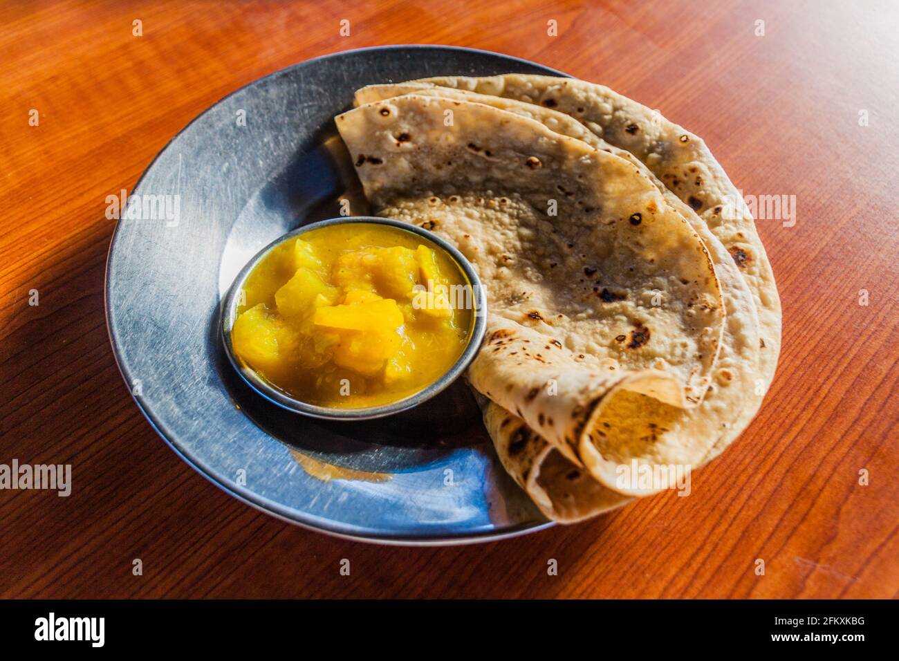 Indian food - mango chutney with chapati Stock Photo - Alamy