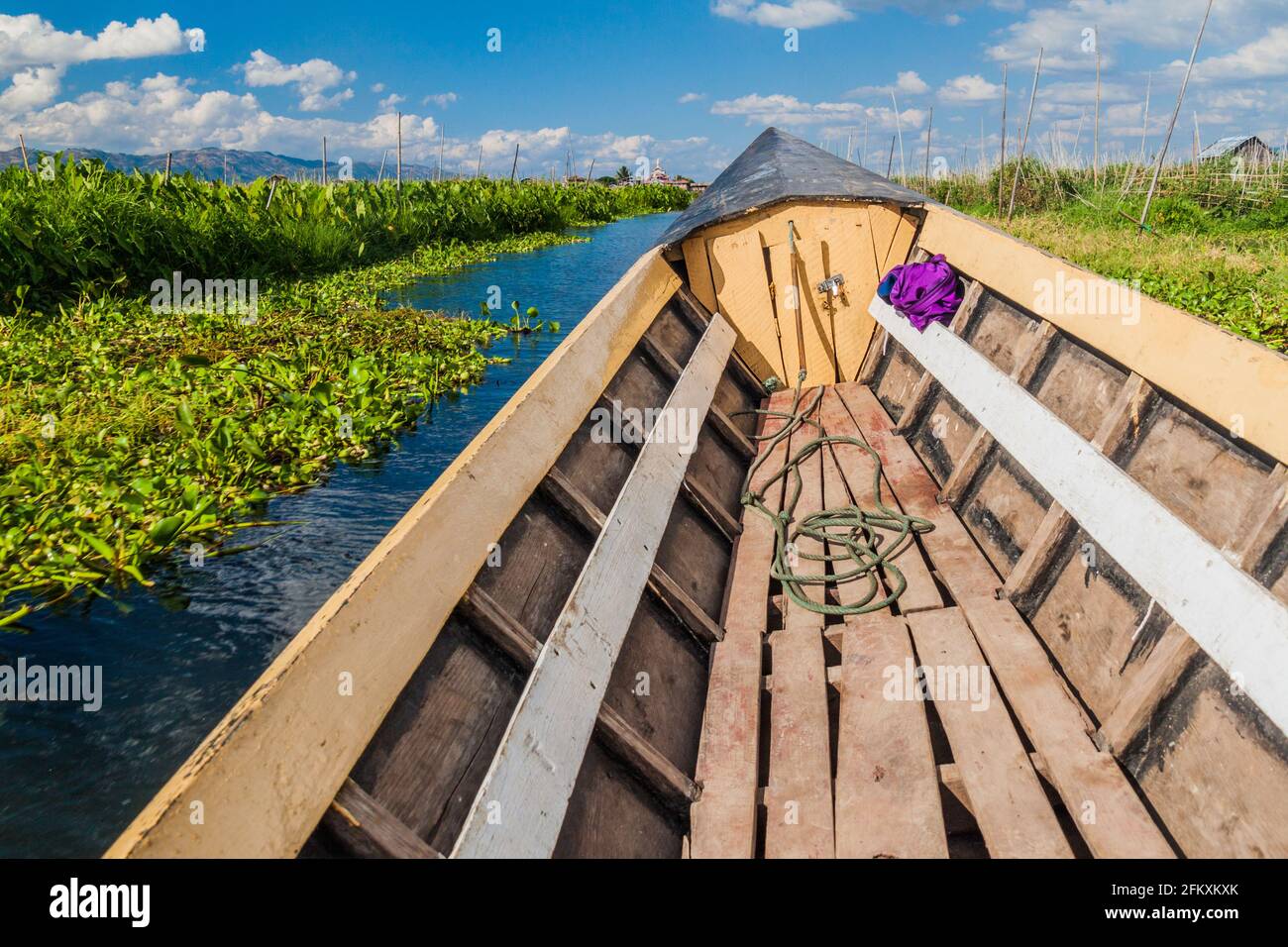 Wooden boat and floating gardens at Inle lake, Myanmar Stock Photo - Alamy