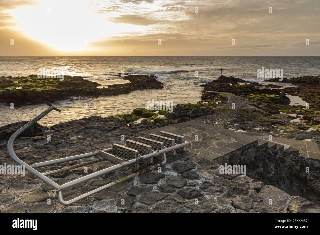 Natural view of a broken ladder left on the pavement surface on the ...