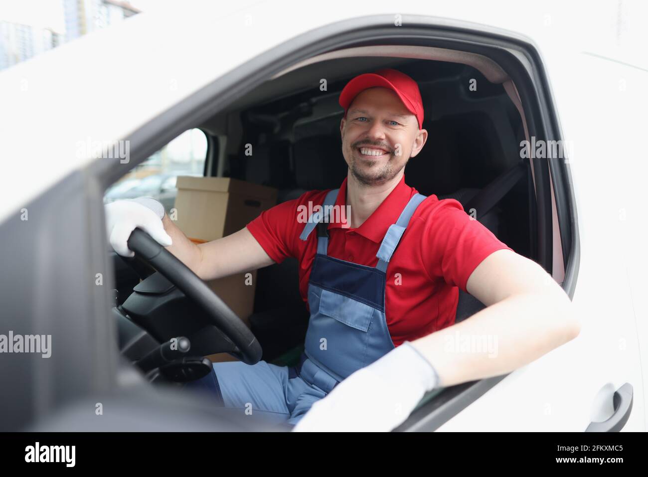 Courier driving hi-res stock photography and images - Alamy