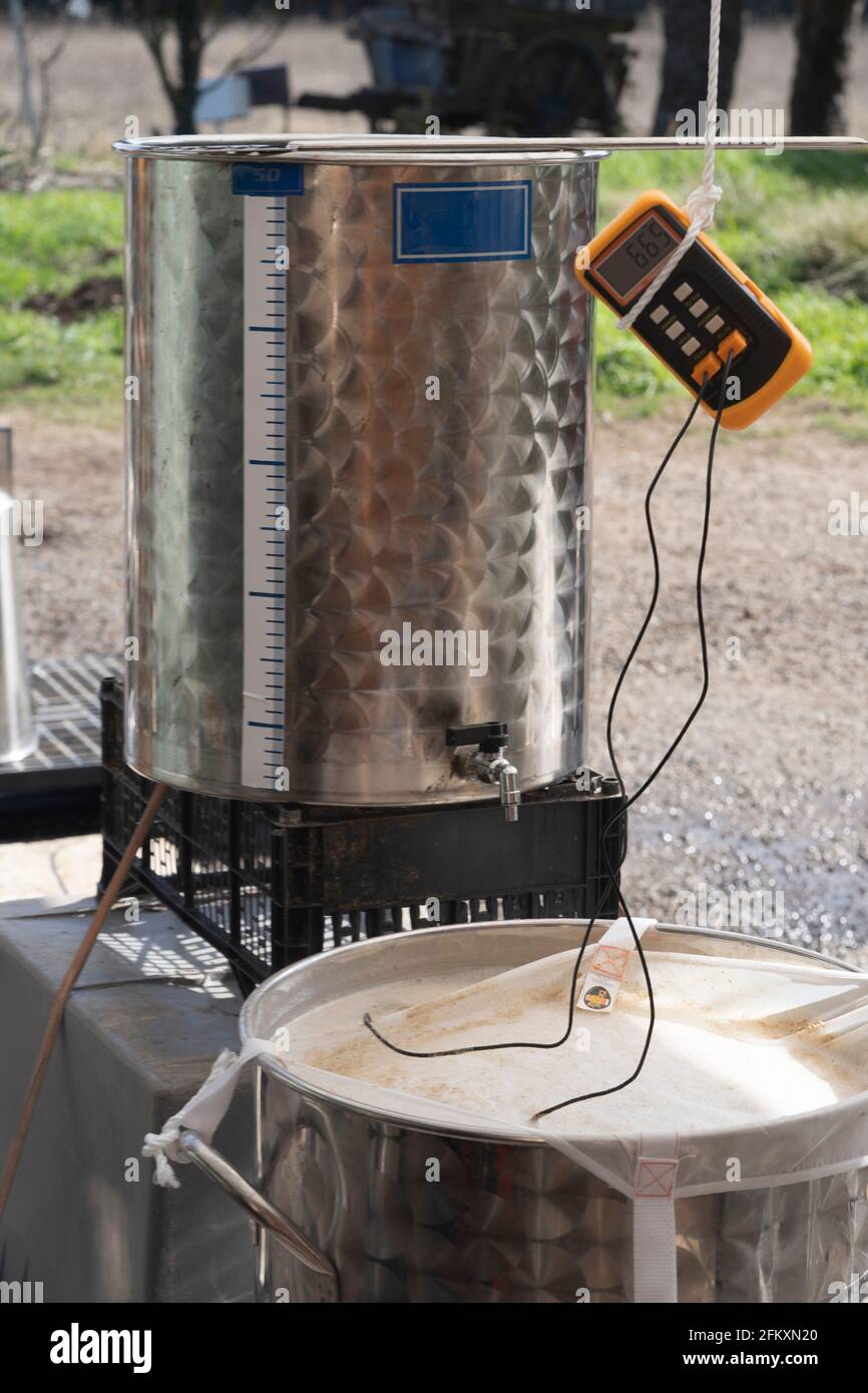 Measuring temperature and attributes of mash and the brew, at a outdoo ...